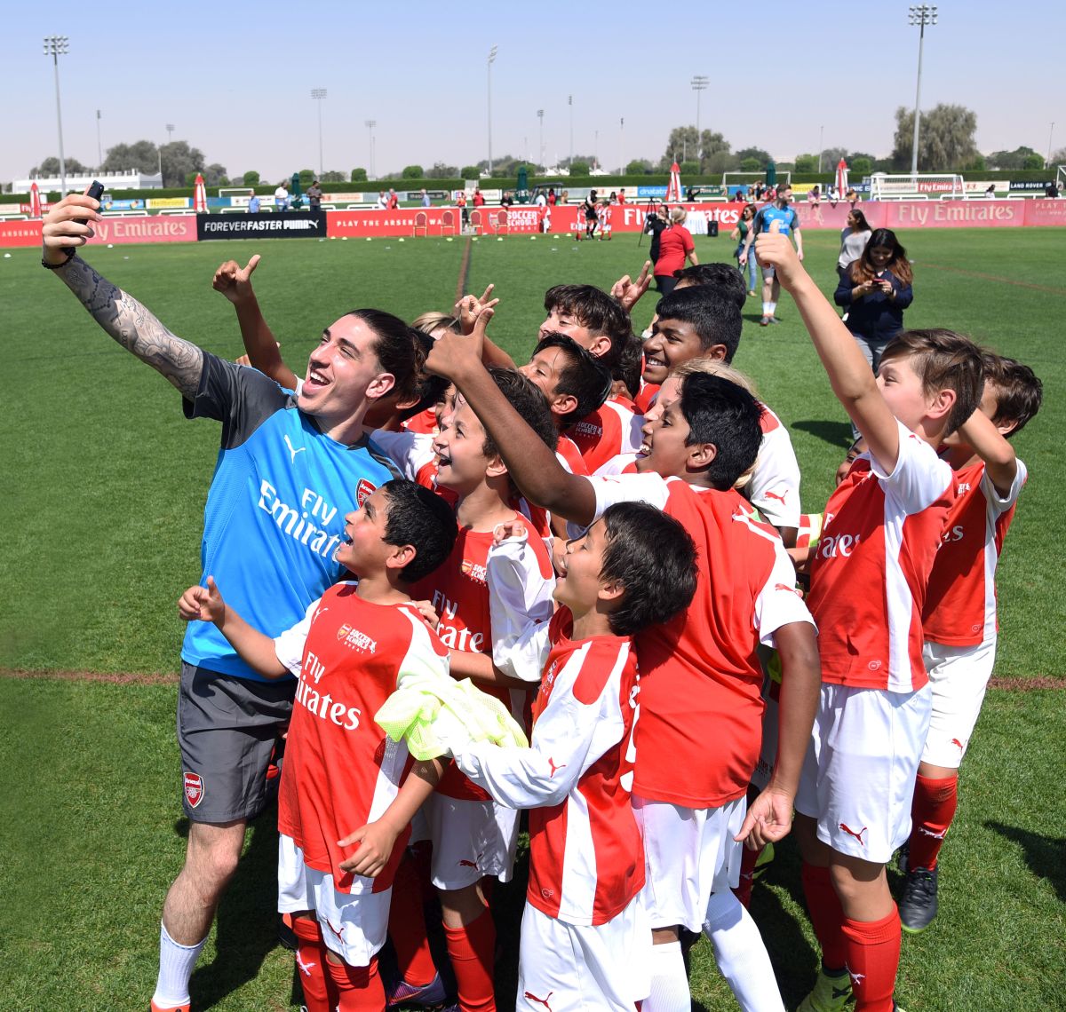 Arsenal Players put students through their paces at the Arsenal Soccer ...